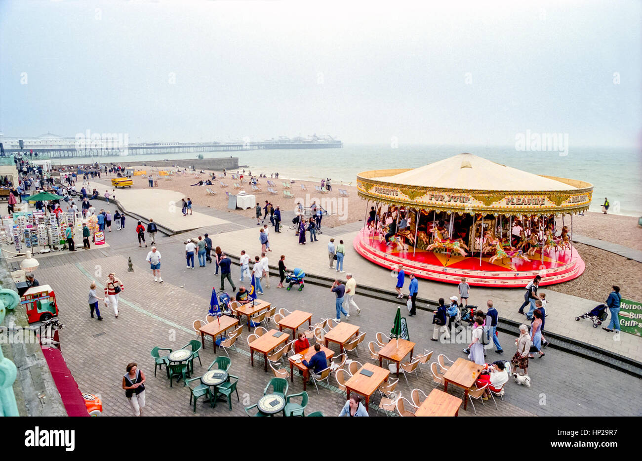 Family enjoying a spring day out on Brighton beach Stock Photo - Alamy