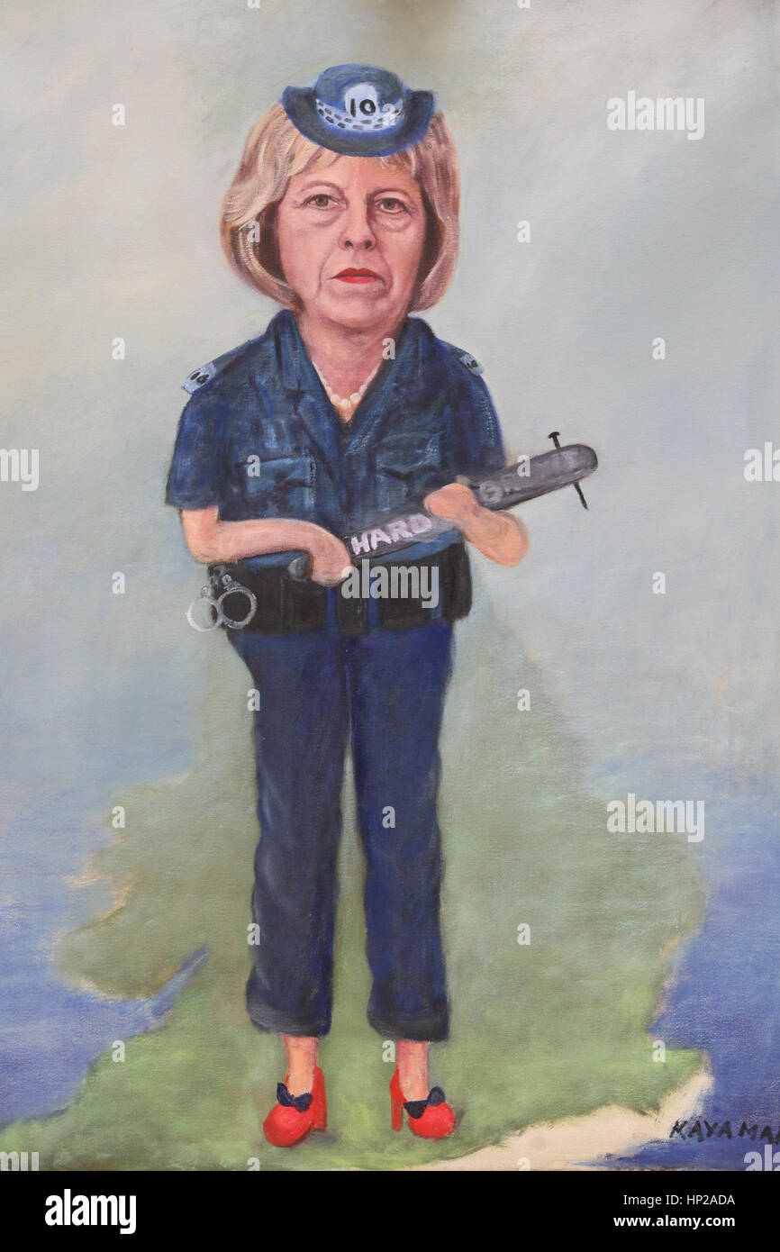 Artist Kaya Mar with a portrait painting of Prime Minister Theresa May ...