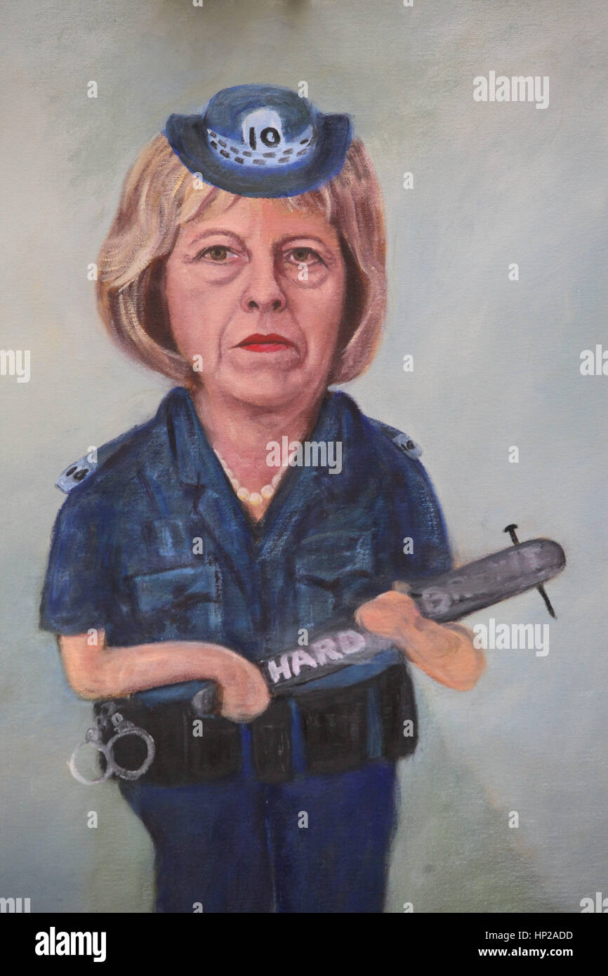 Artist Kaya Mar with a portrait painting of Prime Minister Theresa May ...