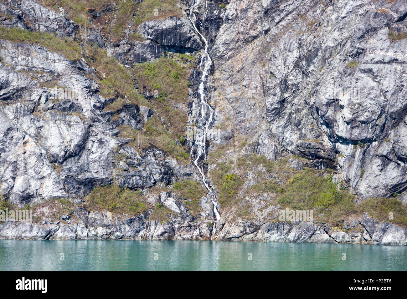 The view of a little waterfall in Glacier Bay national park (Alaska ...