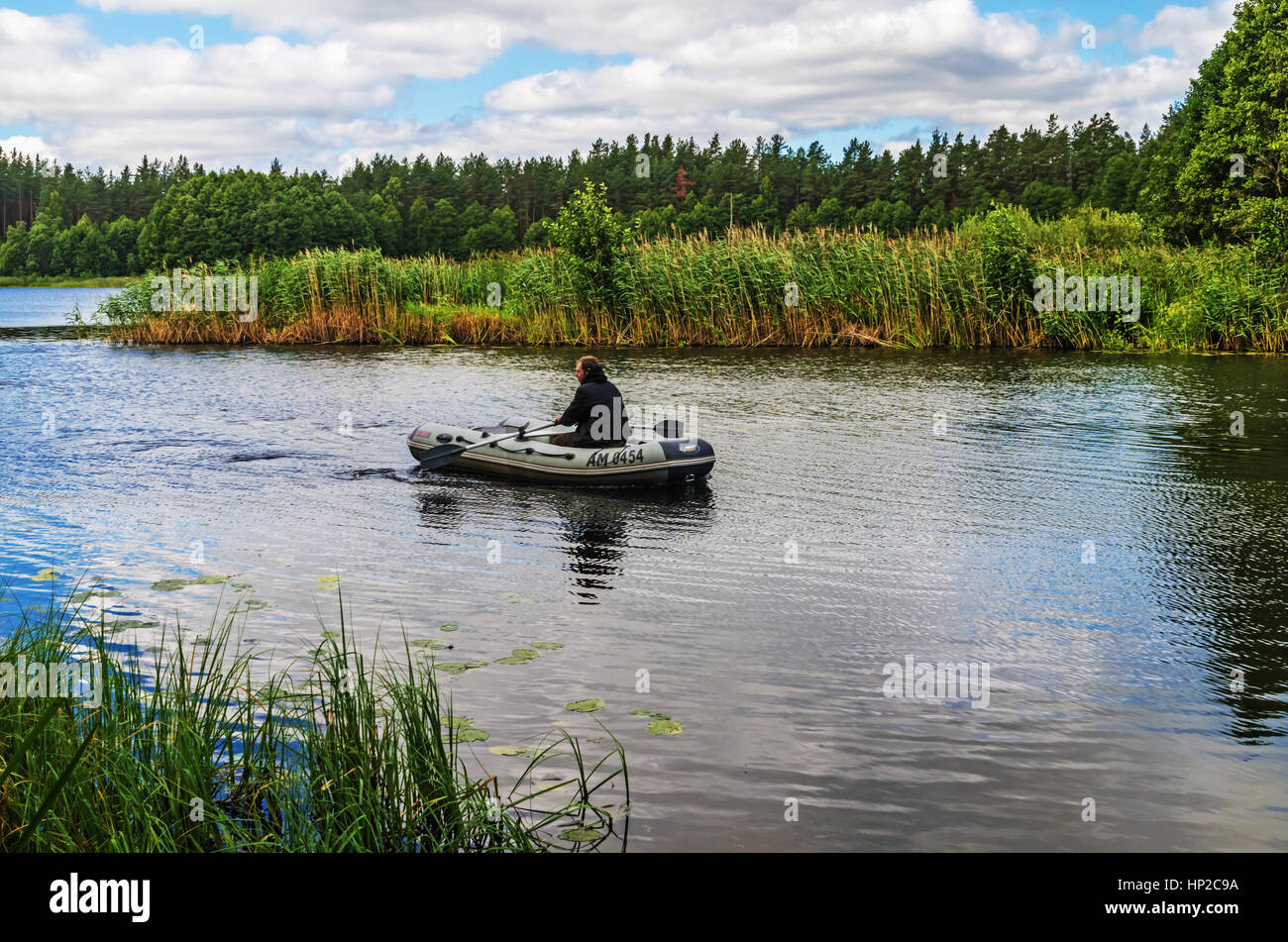 Fishing on the lake Stock Photo - Alamy