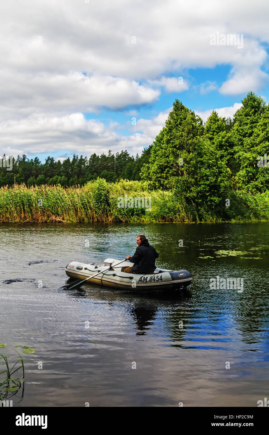 Fishing on the lake Stock Photo - Alamy