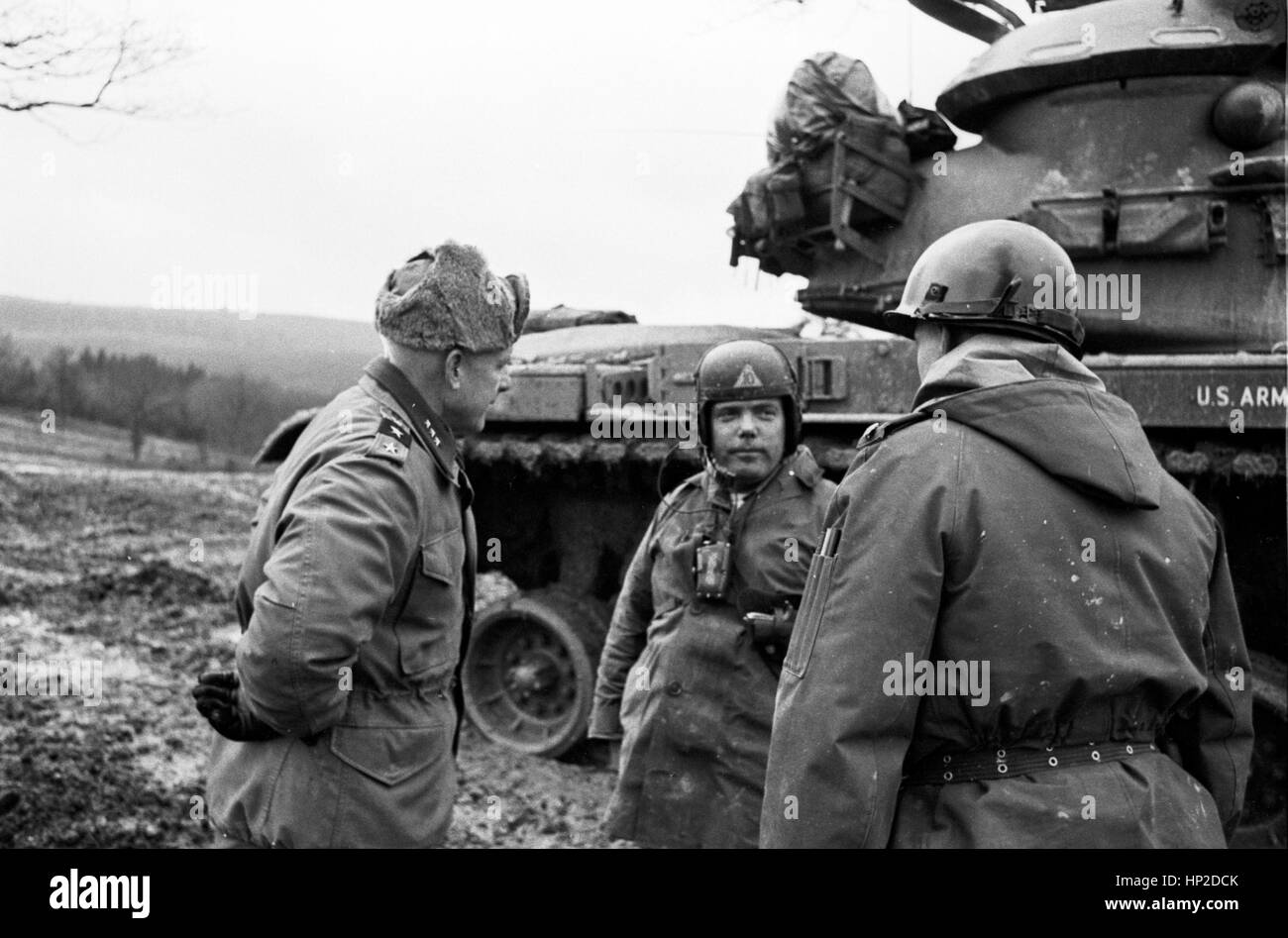 General Garrison H. Davidson , right, speaking with a soldier Stock ...
