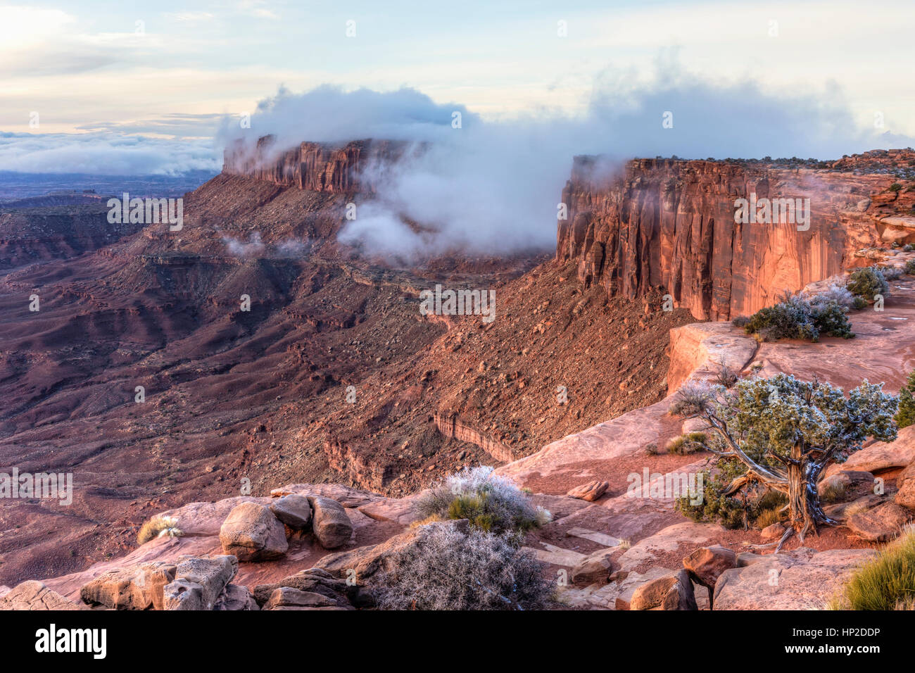 Fog envelops Junction Butte seen from Grand Viewpoint in Canyonlands ...