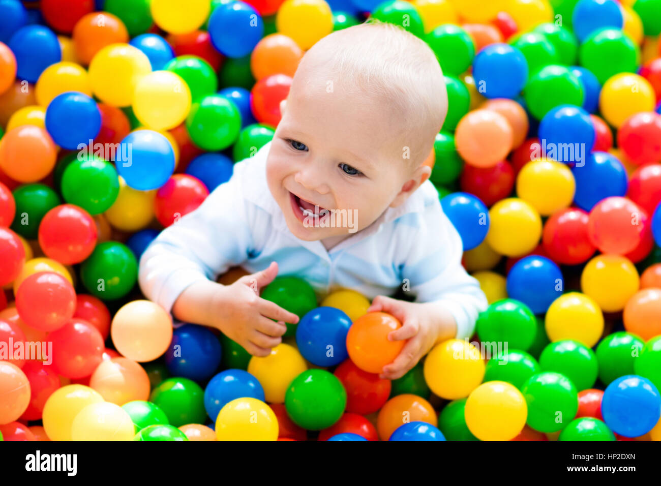 Child in ball pit hi-res stock photography and images - Alamy