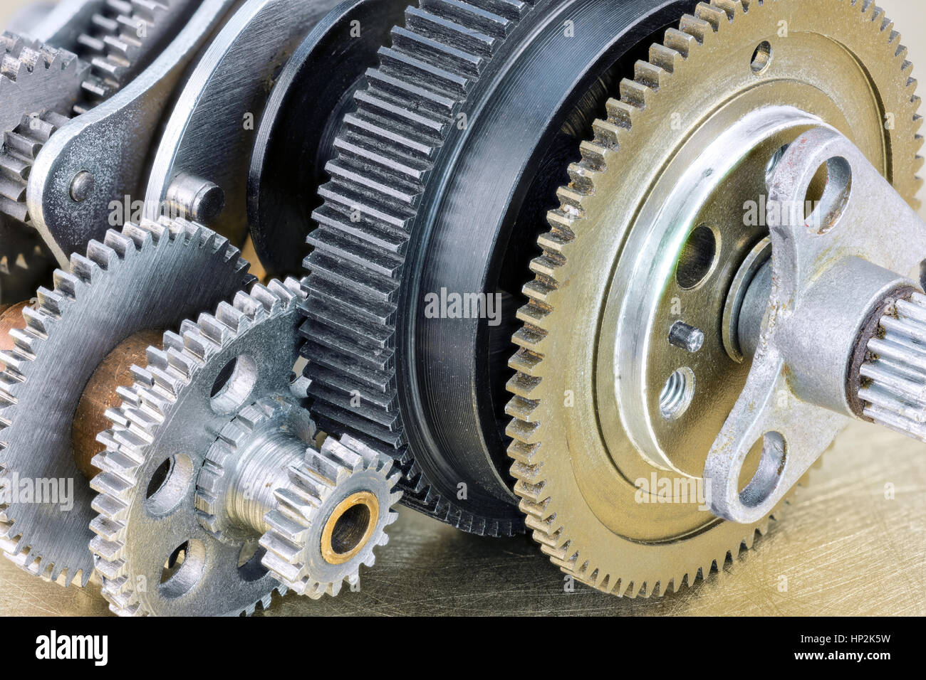 mechanical gear cogwheels mechanism on industrial background closeup ...