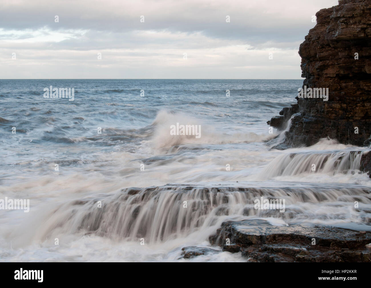Waves breaking against the rocks at Souter Beach, National Trust ...