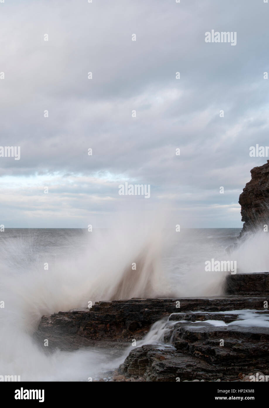 Waves breaking against the rocks at Souter Beach, National Trust ...