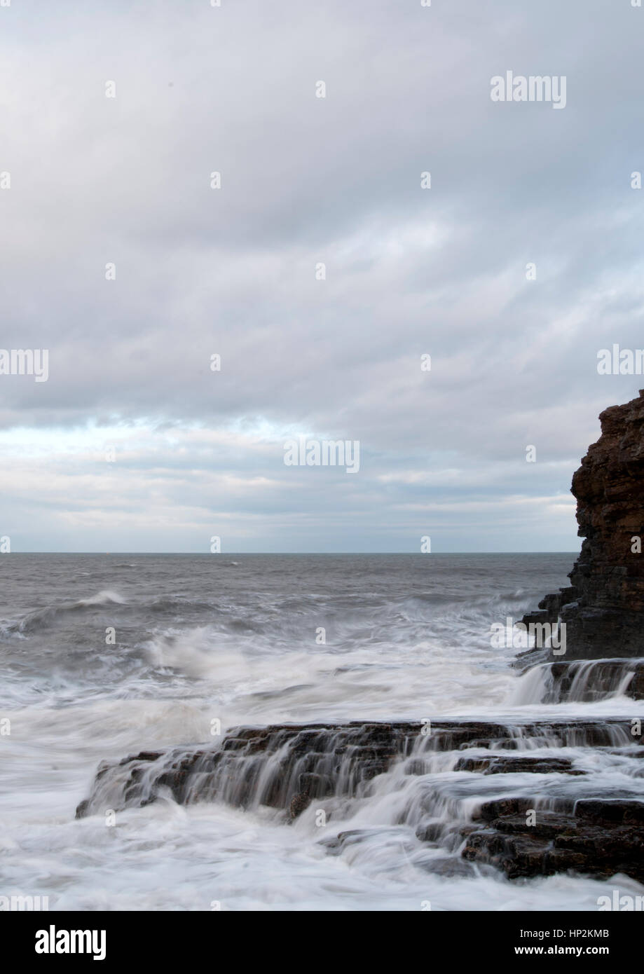 Waves breaking against the rocks at Souter Beach, National Trust ...