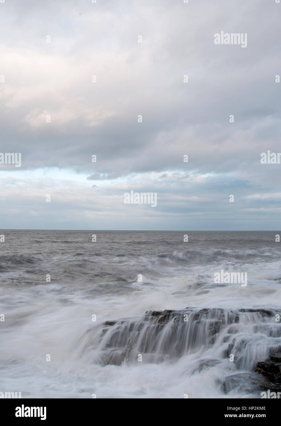 Waves breaking against the rocks at Souter Beach, National Trust ...