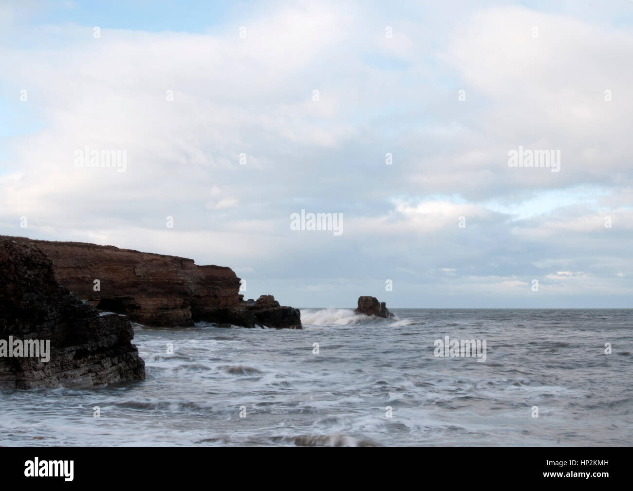Waves breaking against the rocks at Souter Beach, National Trust ...