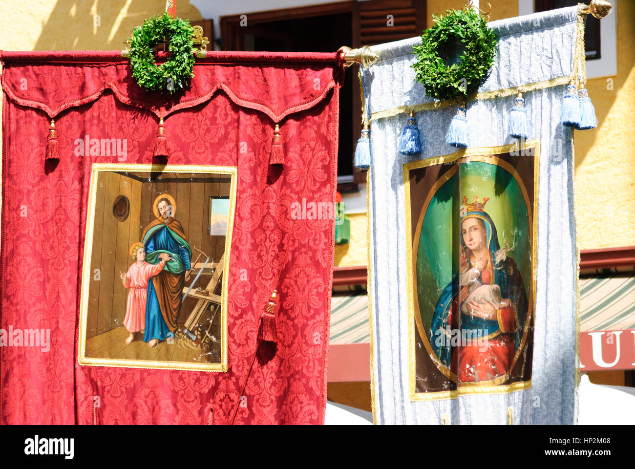 Hallstatt, Corpus Christi procession in the market square; Church flags ...