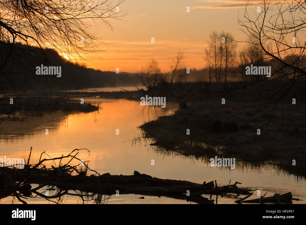 Beginning of sunrise over the river Stock Photo - Alamy