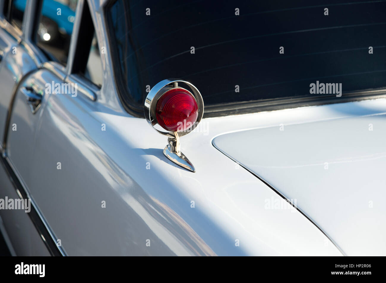 Detail close up of a rear indicator on a 1950's classic American car in ...
