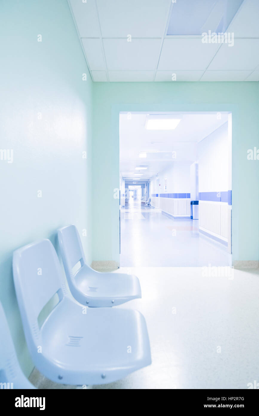 long corridor in hospital with chairs Stock Photo - Alamy