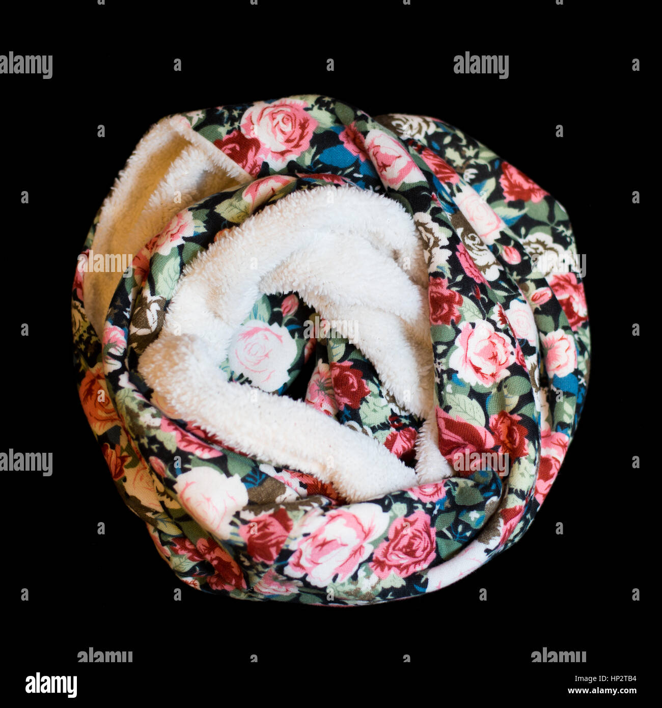 Scarf multicolored clothes on a black background Stock Photo - Alamy