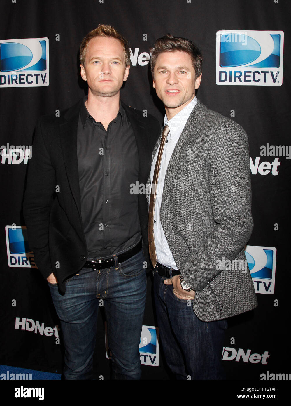 Neil Patrick Harris, left, and David Burtka arrive at the Directv Super ...