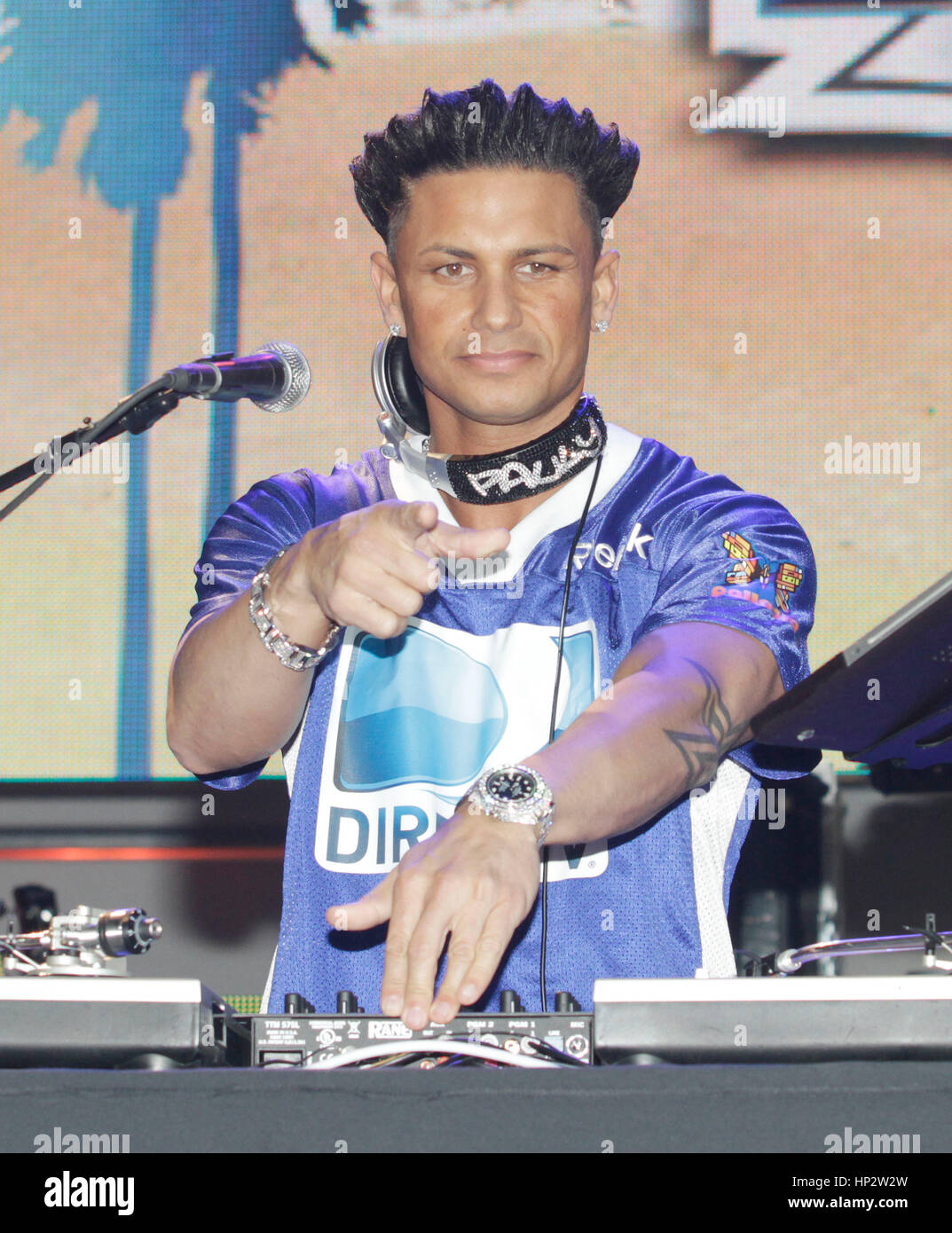DJ Pauly D plays during halftime at Directv's Sixth Annual Celebrity ...