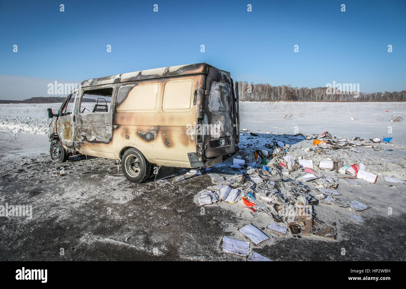 Lonely burnt car on a suburban highway in the winter Stock Photo - Alamy