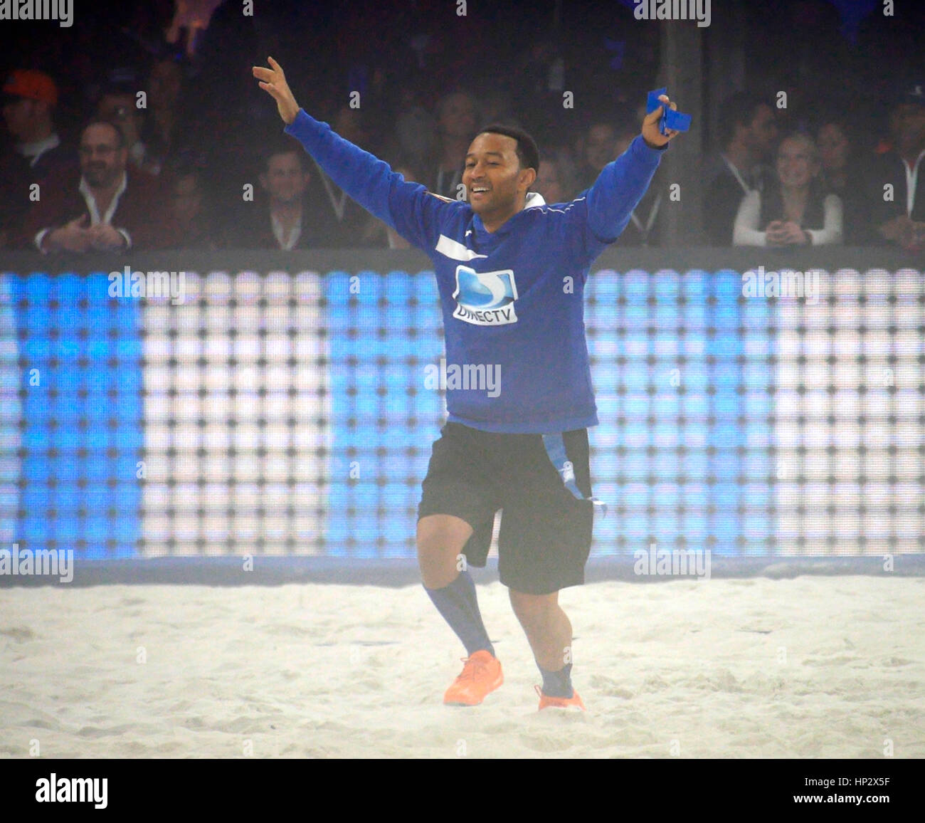 John Legend celebrates at Directv's 8th Annual Celebrity Beach Bowl on ...