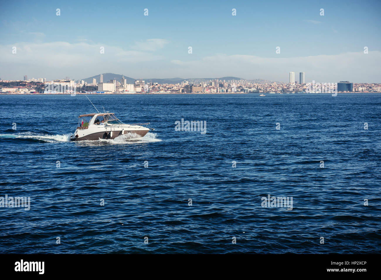 Good boat floats on the sea. Italy Stock Photo - Alamy