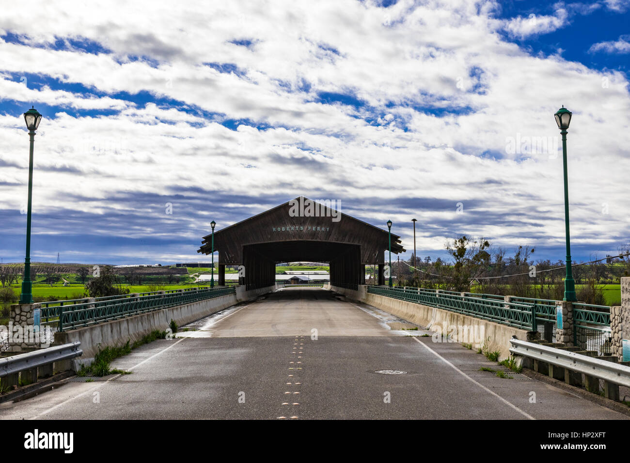 The Tuolumne River and covered bridge at Roberts ferry along Yosemite ...