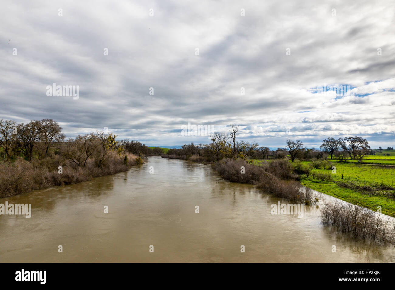 The Tuolumne River and covered bridge at Roberts ferry along Yosemite ...