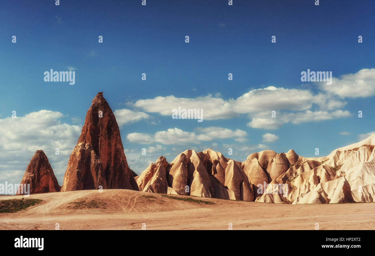 Beautiful Cappadocia on the background of blue sky with white Stock ...