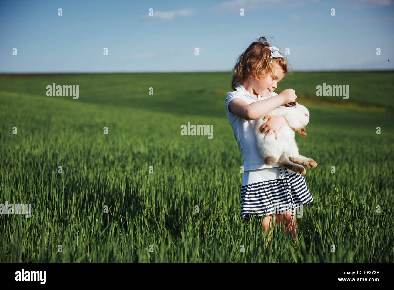Child rabbit field hi-res stock photography and images - Alamy