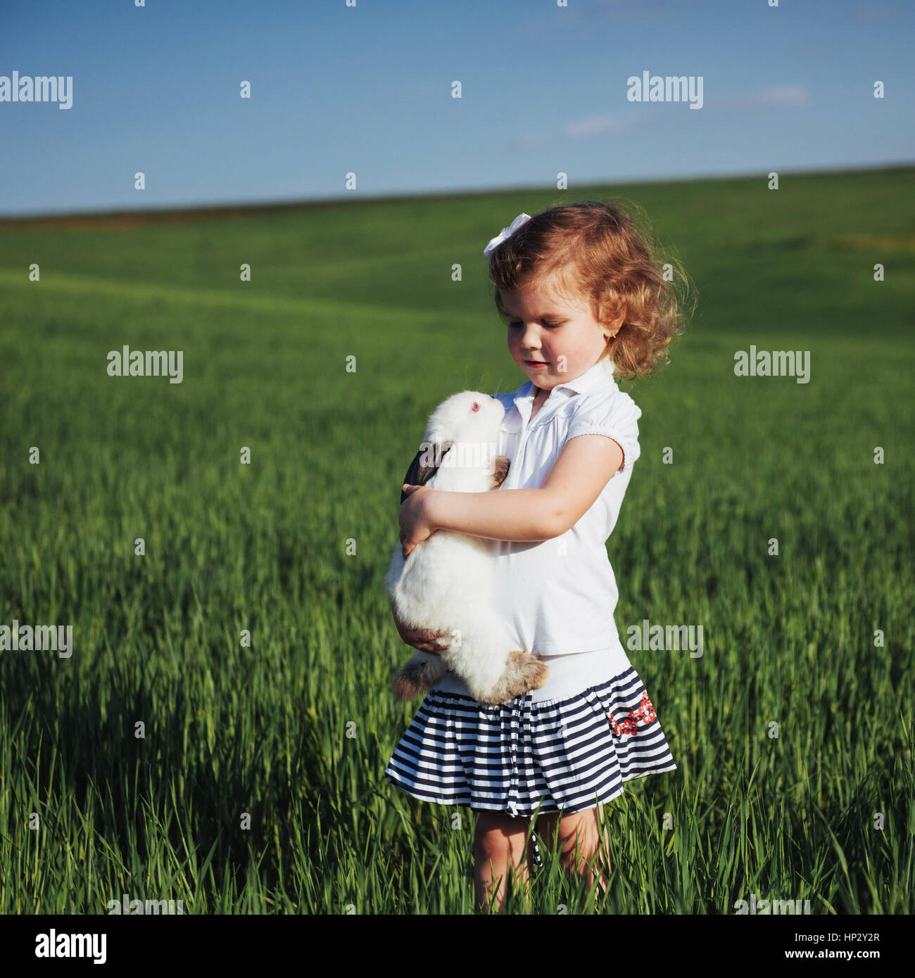 Child rabbit field hi-res stock photography and images - Alamy