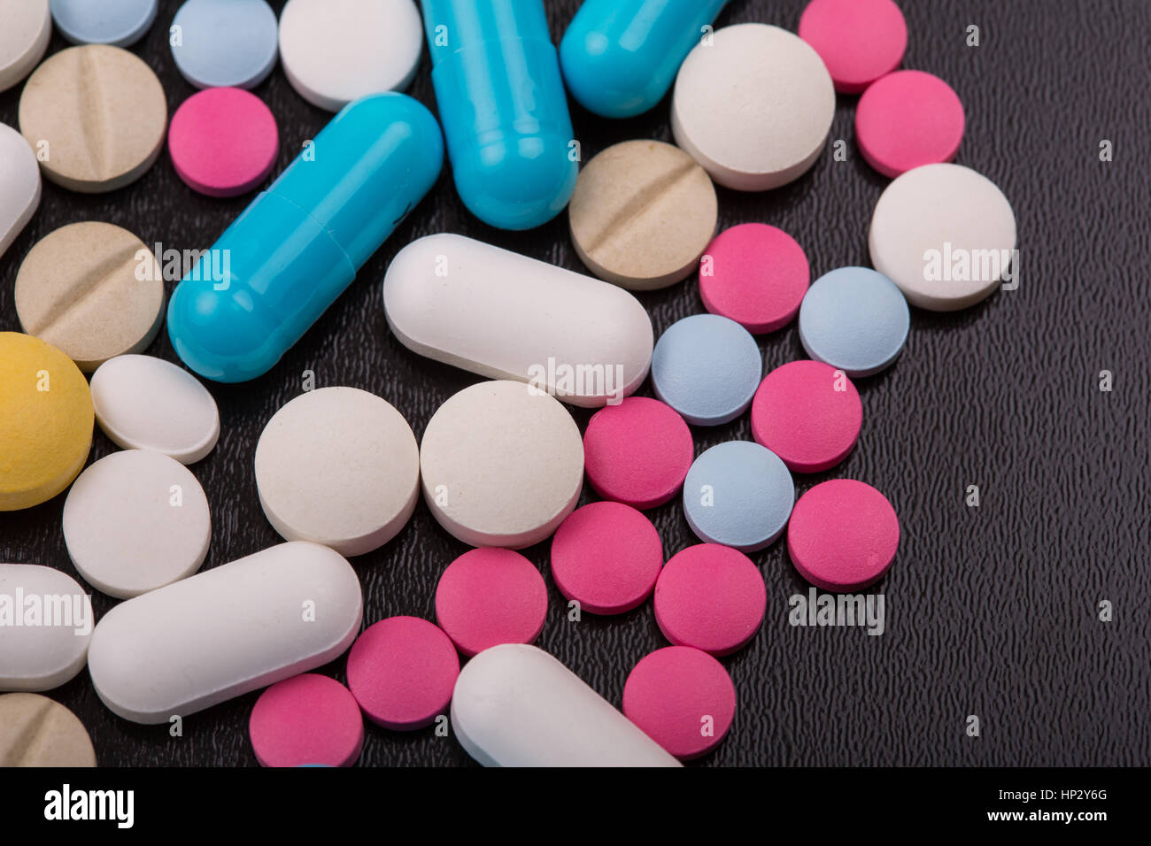 different tablets pills capsule heap mix therapy drugs Stock Photo - Alamy