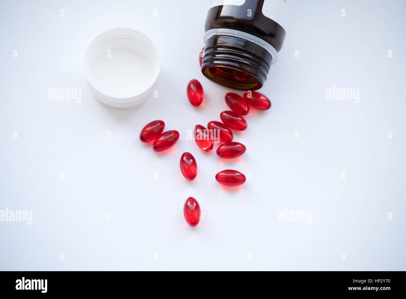 Tabs Vitamins, omega 3, Medications tablets and capsules in a beaker ...