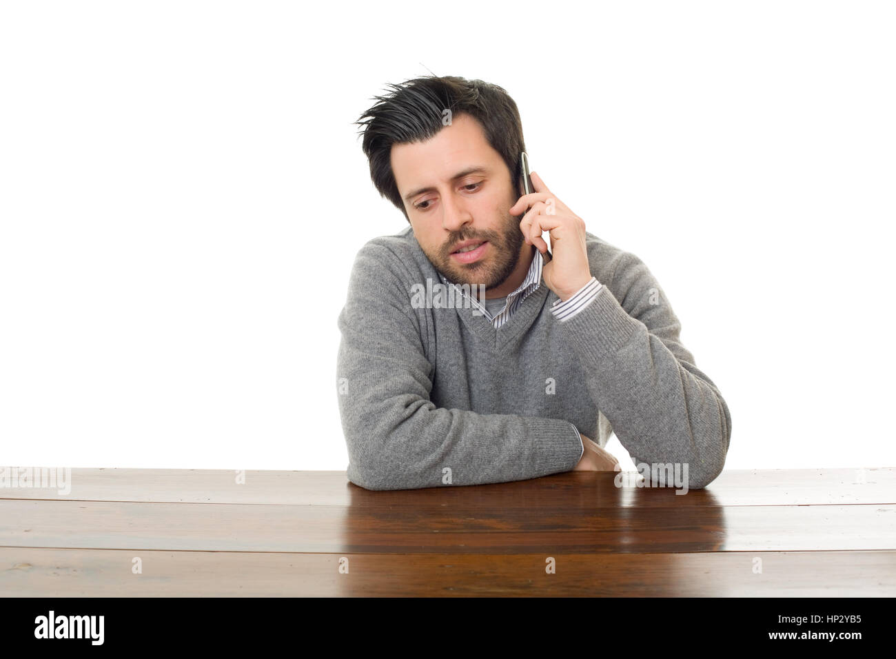 happy man on a desk on the phone, isolated Stock Photo - Alamy