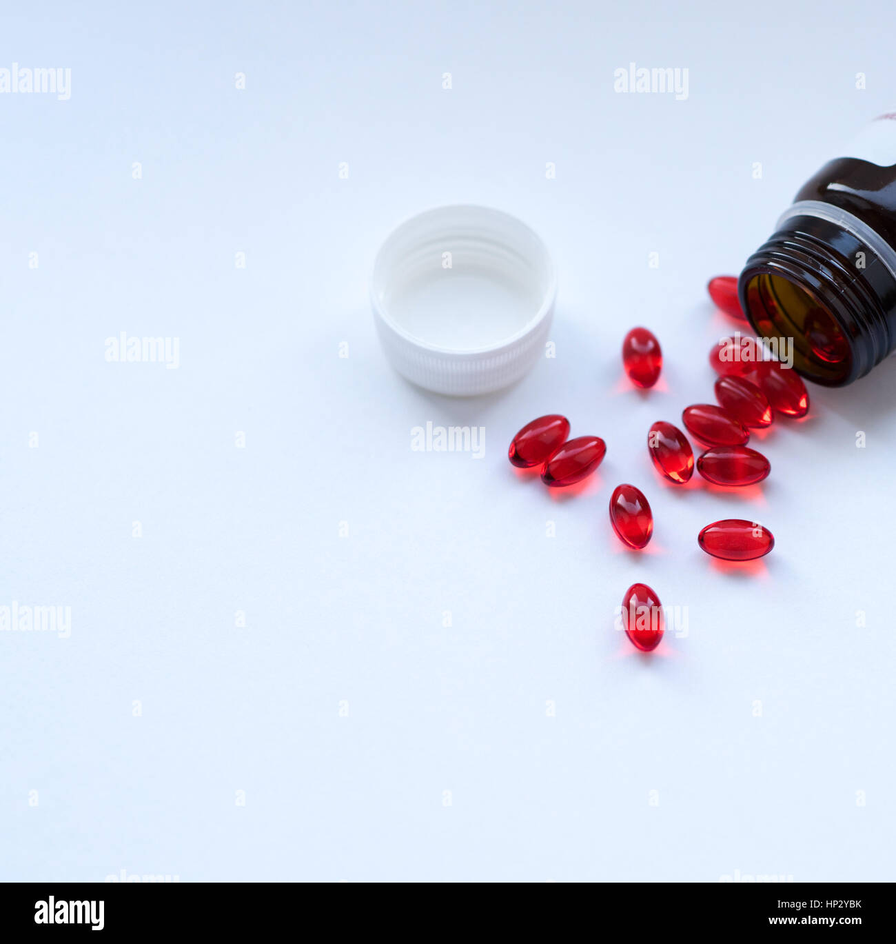 Tabs Vitamins, omega 3, Medications tablets and capsules in a beaker ...