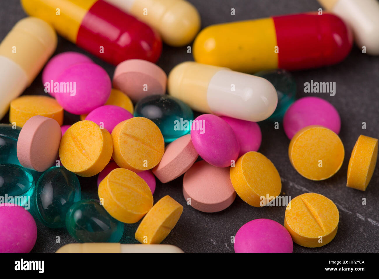 different tablets pills capsule heap mix therapy drugs Stock Photo - Alamy