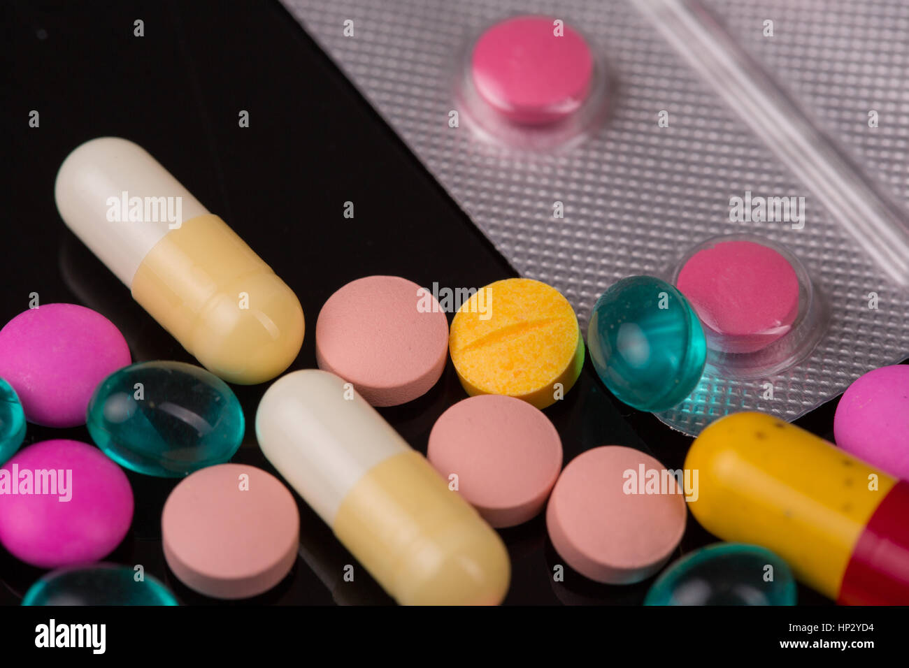 different tablets pills capsule heap mix therapy drugs Stock Photo - Alamy