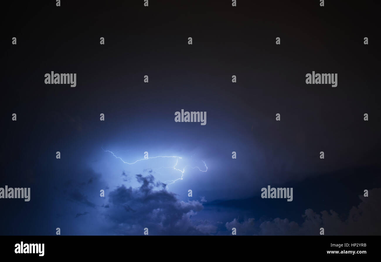 Lightning strike on the cloudy dark sky. Fantastic summer night Stock ...