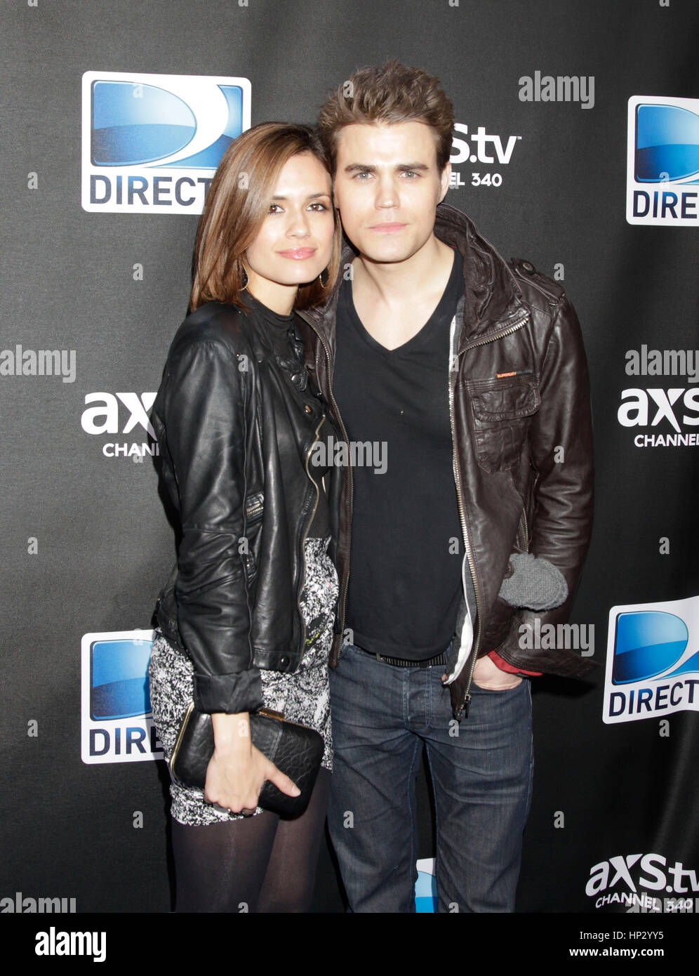 Torrey DeVitto and Paul Wesley arrive for the Directv Super Saturday ...