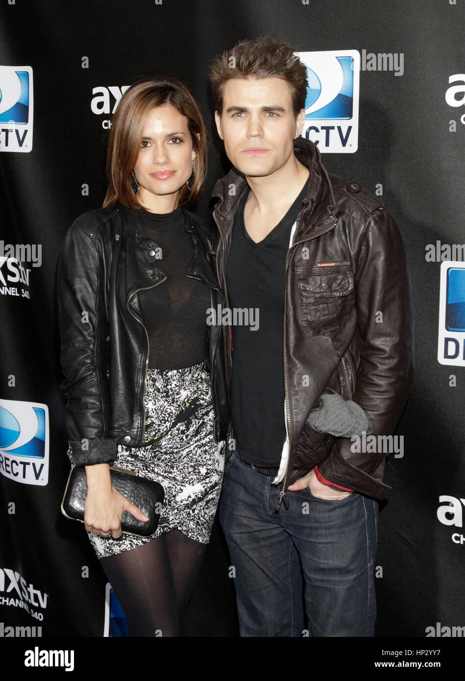 Torrey DeVitto and Paul Wesley arrive for the Directv Super Saturday ...