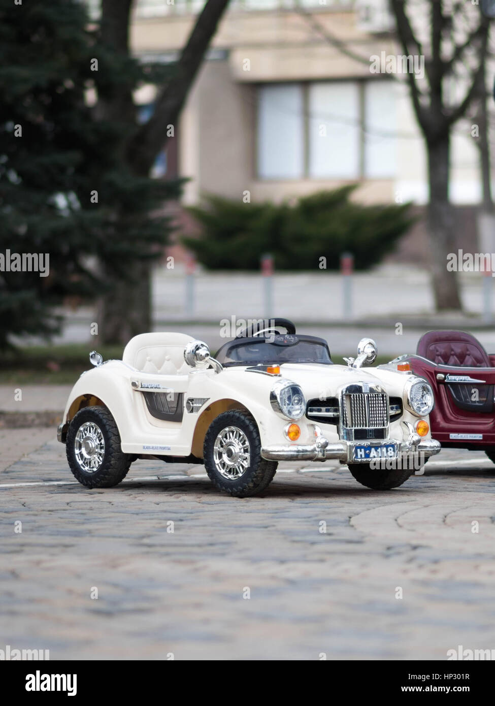 Retro car (mini) parked in city street Stock Photo - Alamy