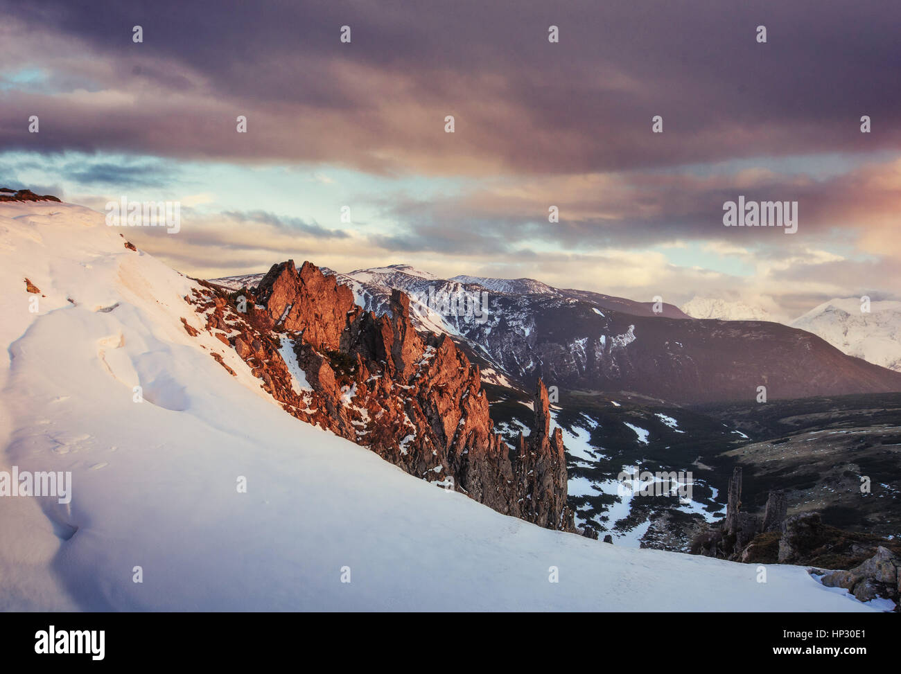 Colorful spring sunset over the mountain ranges in the national Stock ...