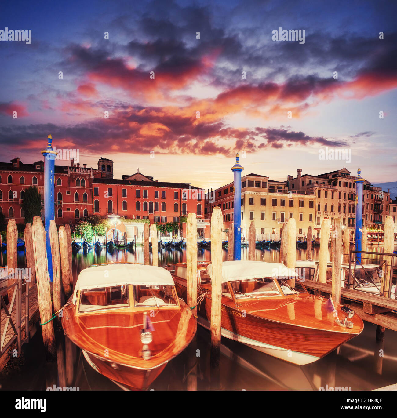 City landscape. Venice at sunset. Green water with boats Stock Photo ...