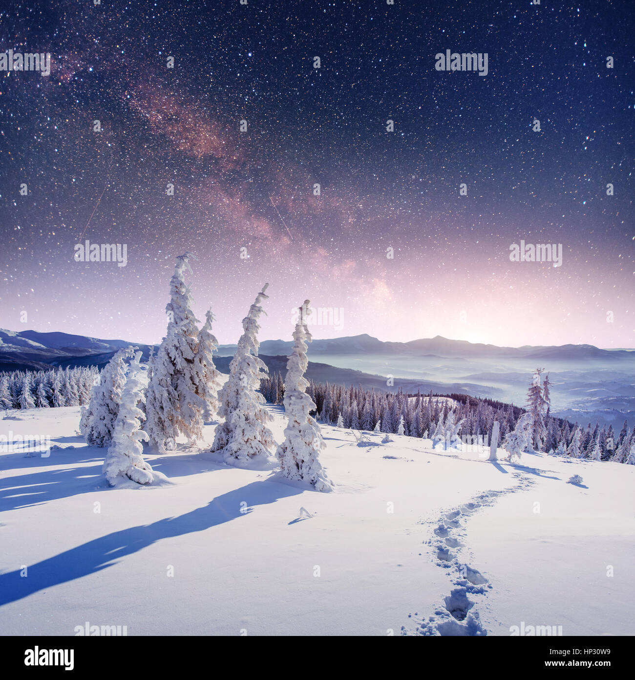 starry sky in winter snowy night. fantastic milky way Stock Photo - Alamy