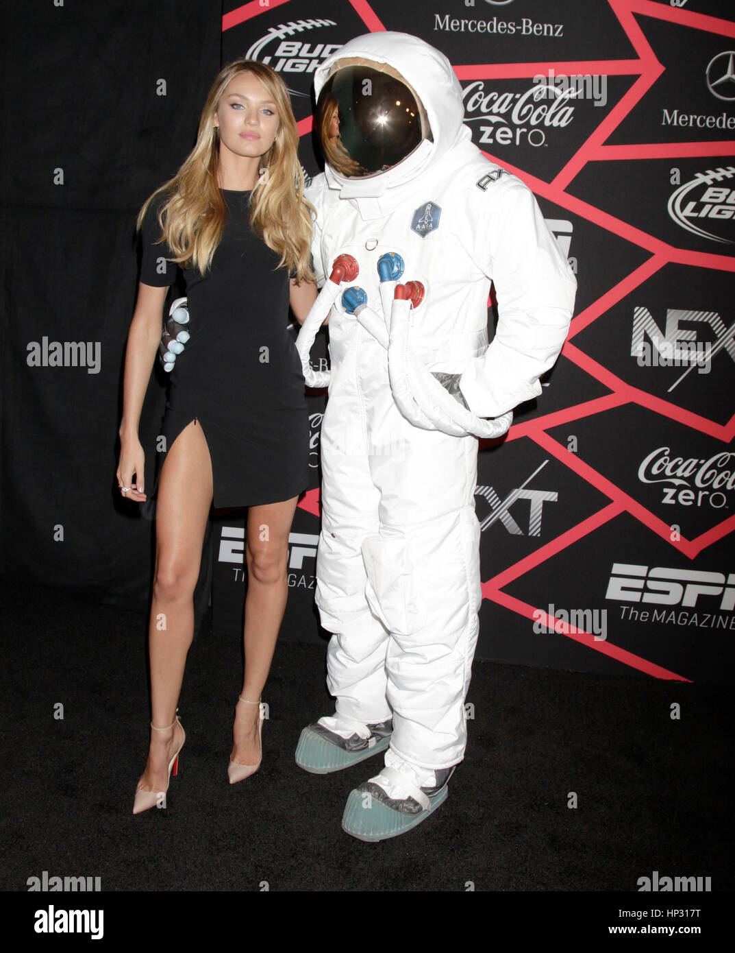 Candice Swanepoel arrives with an Axe Apollo astronaut at the ESPN The ...