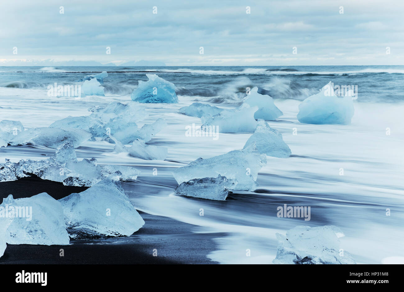 Glacier on black volcanic beach, Iceland Stock Photo - Alamy