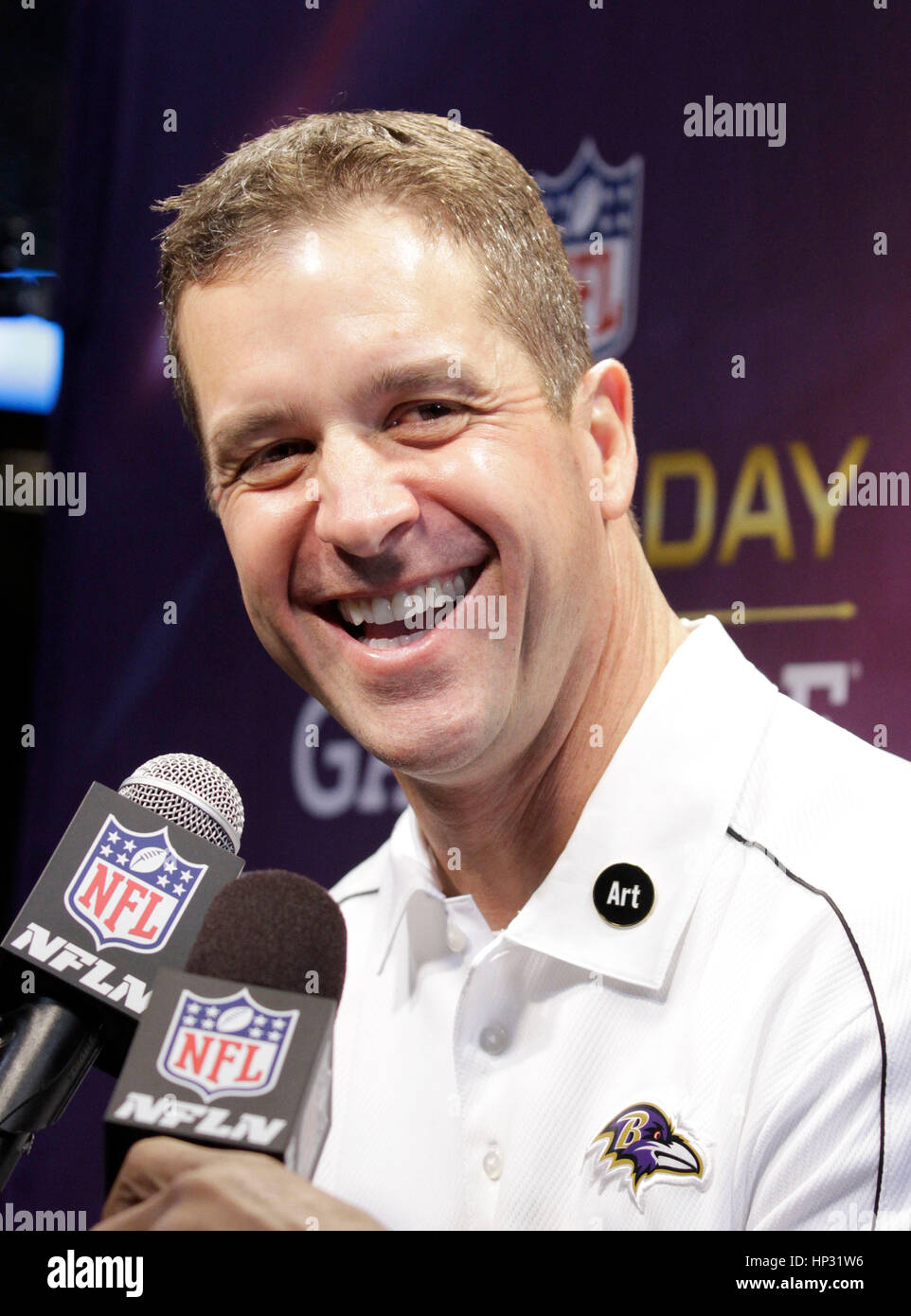 Baltimore Ravens head coach John Harbaugh talks to reporters at the ...