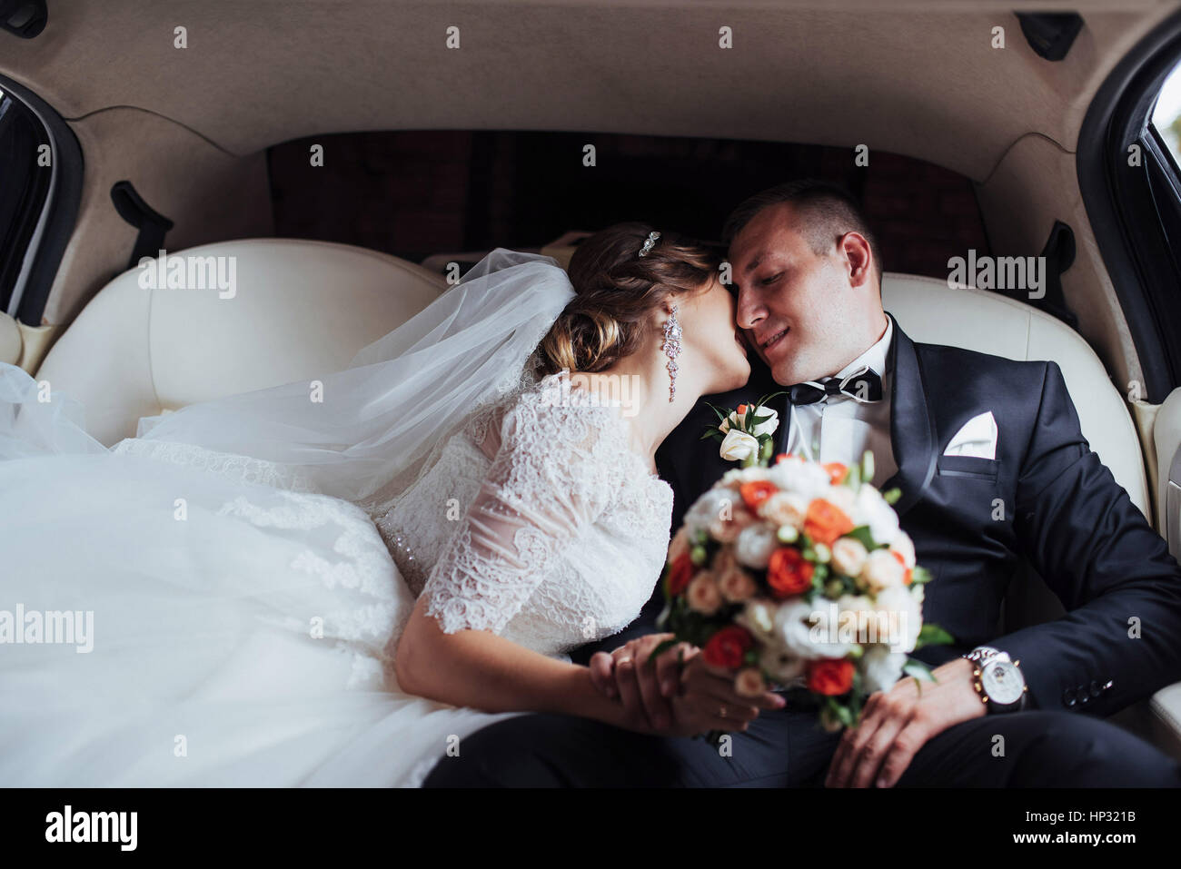 young couple in a car in wedding day Stock Photo - Alamy
