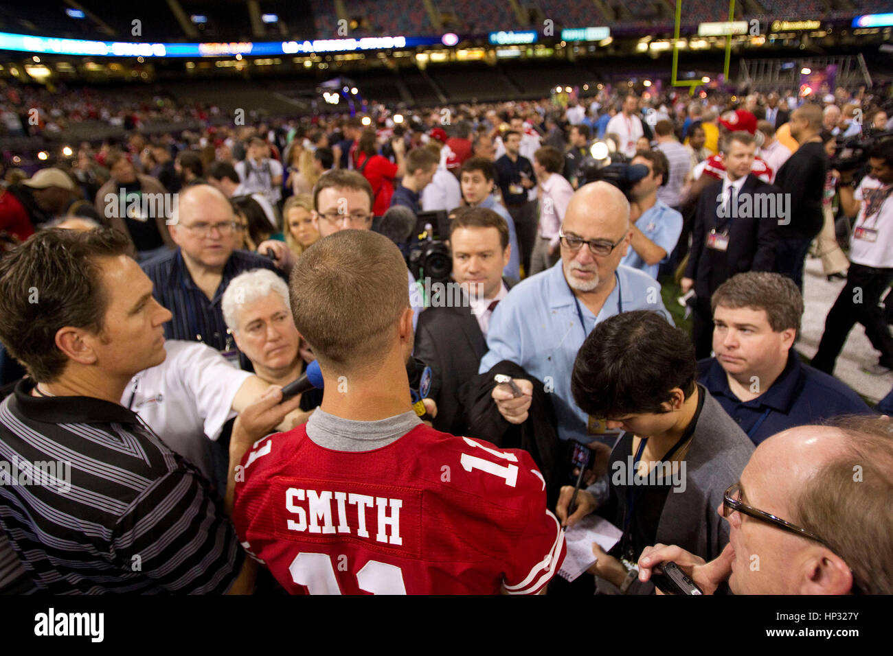 San Francisco 49ers quarter back Alex Smith talks to reporters at the ...