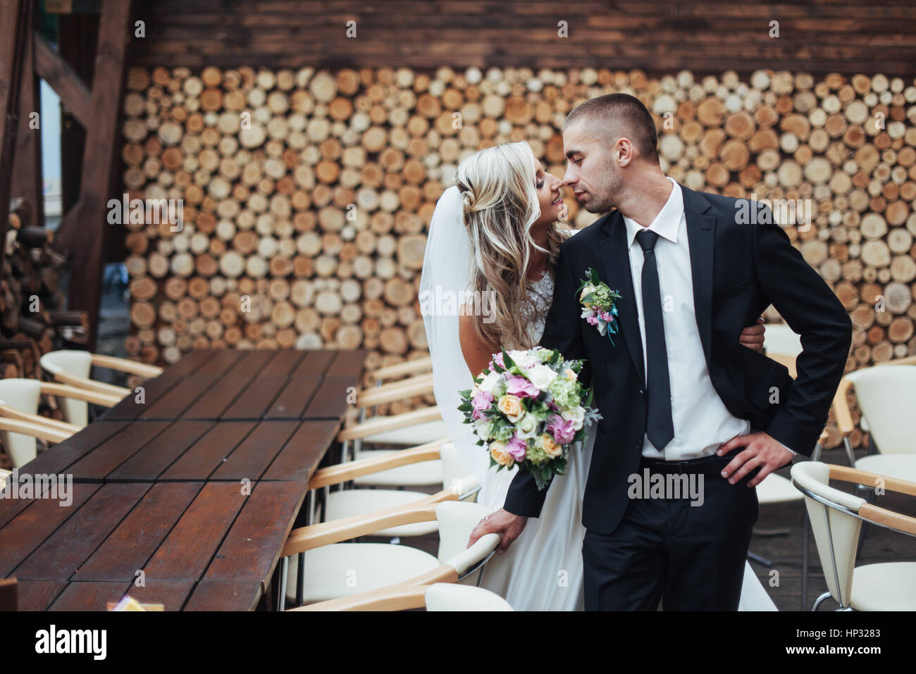 Happy young couple poses for photographers on her happiest day Stock ...