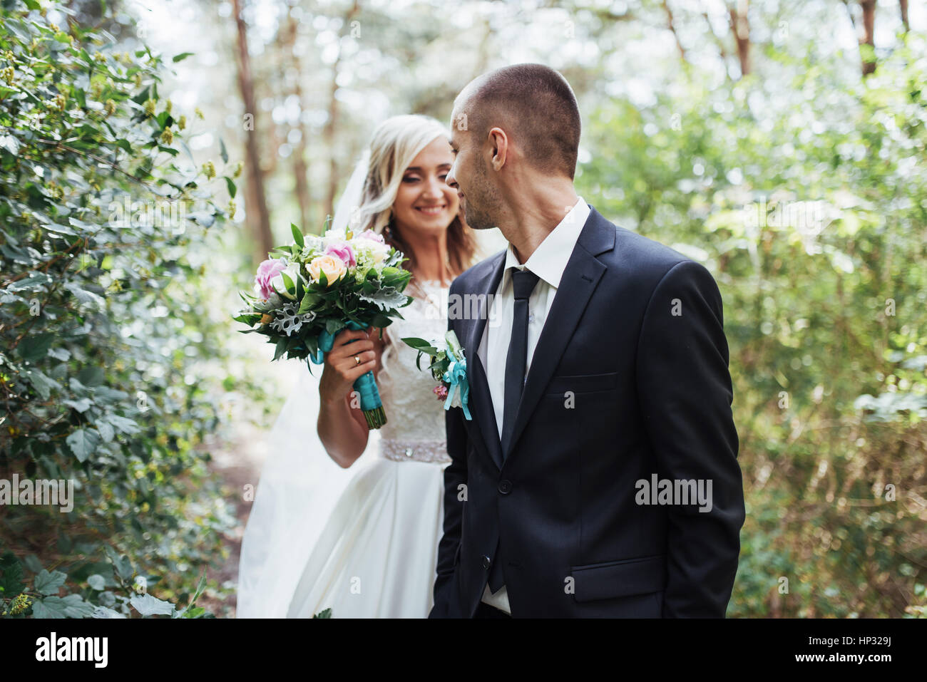 Happy young couple poses for photographers on her happiest day Stock ...